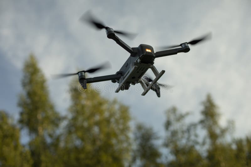 Drone Flies Low. Drone Flight in Sky. Technology of Flight and Shooting ...