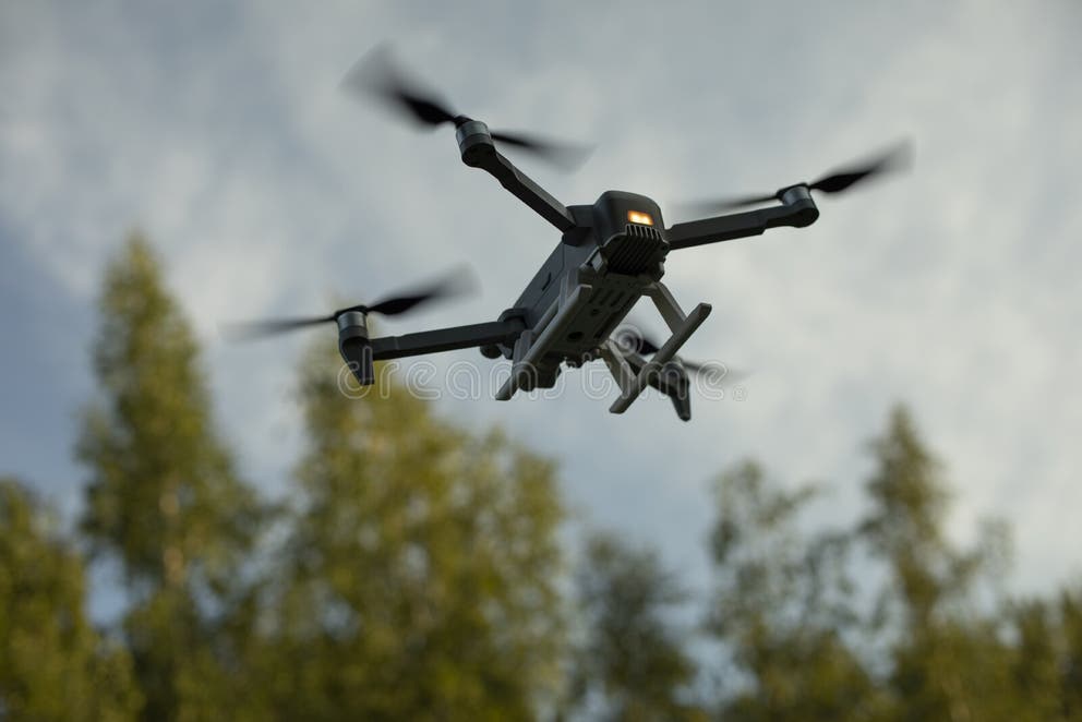 Drone Flies Low. Drone Flight in Sky. Technology of Flight and Shooting ...