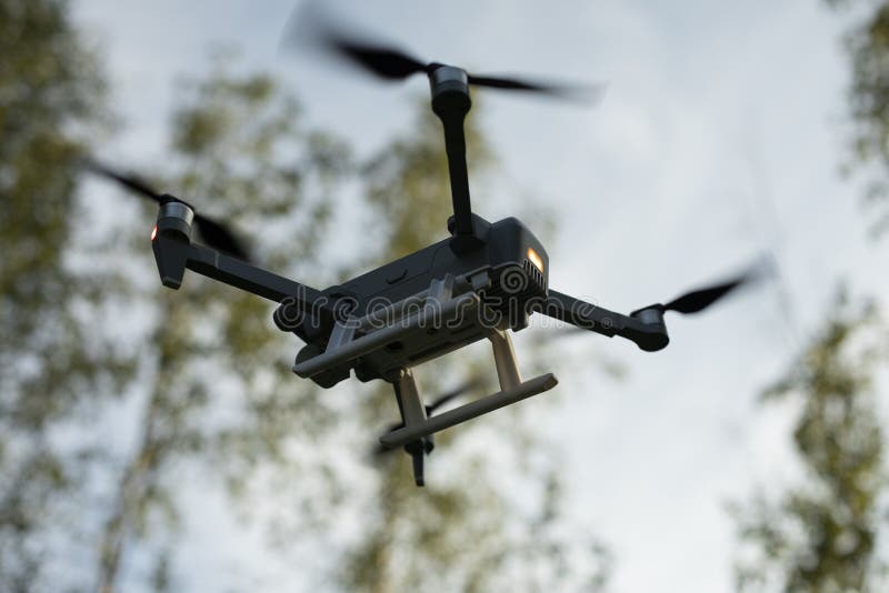 Drone Flies Low. Drone Flight in Sky. Technology of Flight and Shooting ...