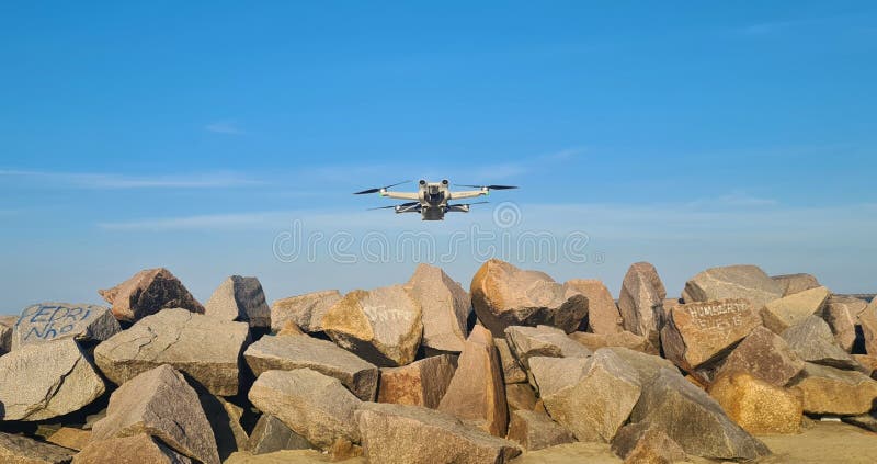 Drone in Flight Making Beautiful Images on the Beach on a Beautiful ...