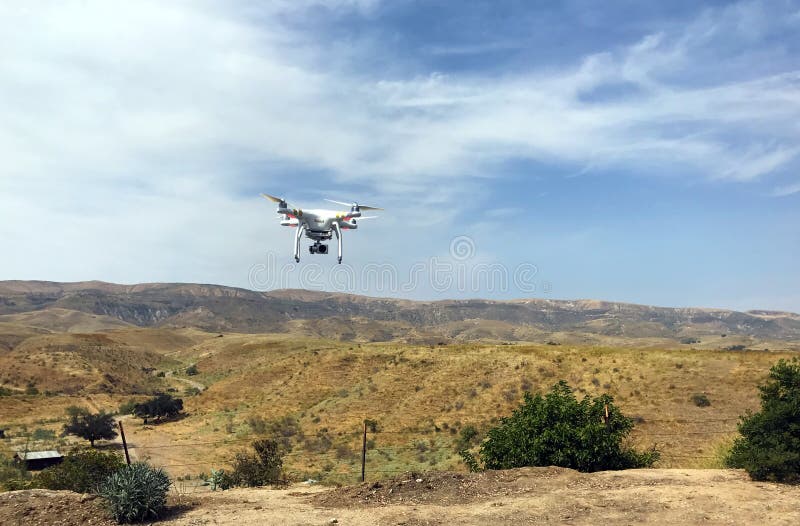 Drone in flight stock photo. Image of carrier, quadrocopter - 52370870