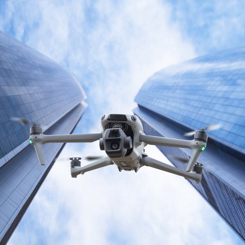 Drone Flying in the Air Over the City Buildings Stock Photo - Image of ...