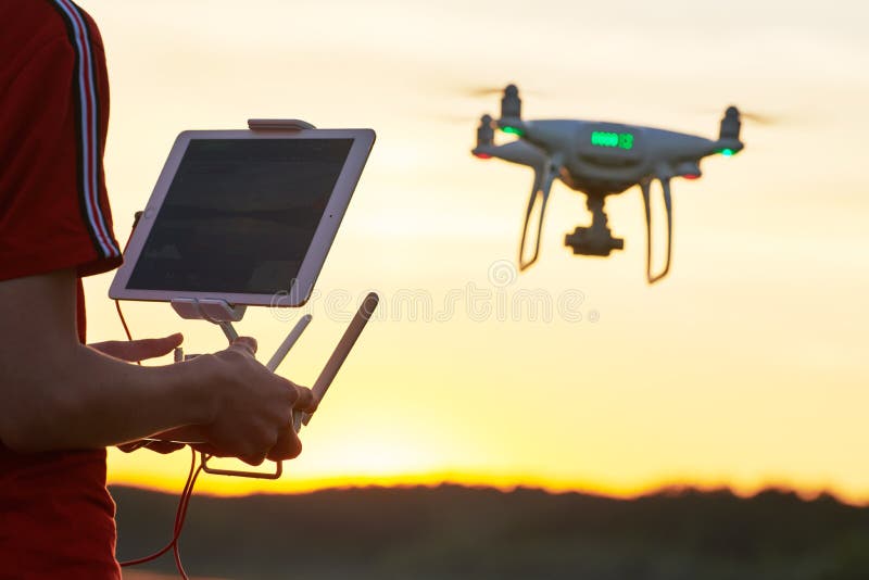 Drone Flying. Copter Pilotage at Sunset Stock Photo - Image of ...