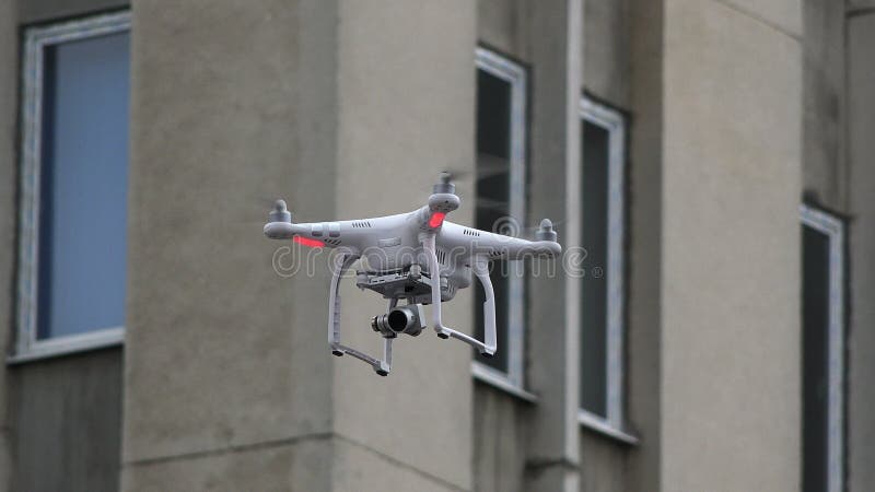 Drone Flying and Filming Outside 4K Stock Footage - Video of controlled ...