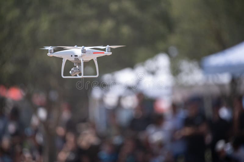 Drone Flying in an Outdoor Event with Bokeh Lights Stock Image - Image ...