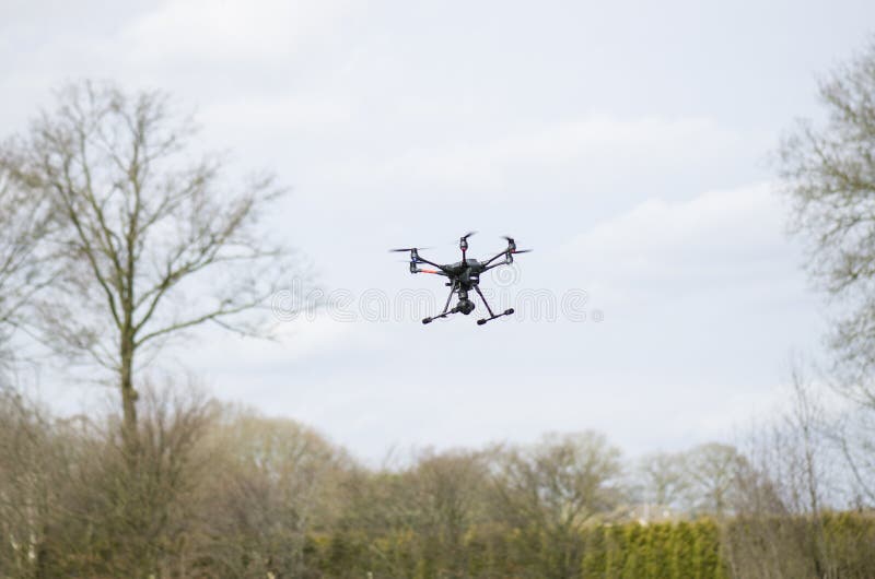 Drone Flying Outdoors between and Above Trees Stock Image - Image of ...