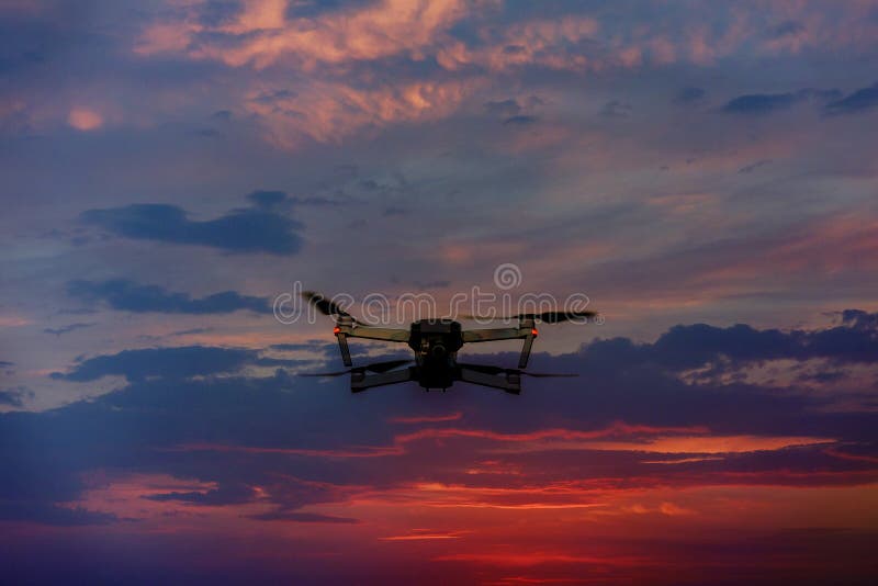 Drone Flying Over a Sunset Sky with Light Clouds Stock Photo - Image of ...