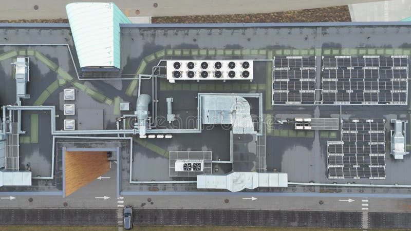 Drone Flying Over Building with Solar Panels System on Its Rooftop ...