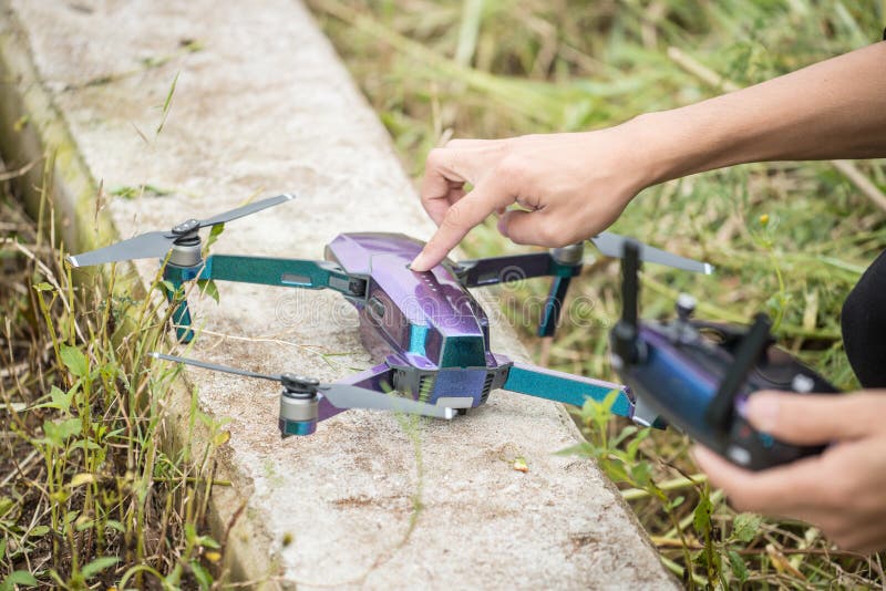 Cropped Shot View of Human Hands Using the Remote Control for Control a ...