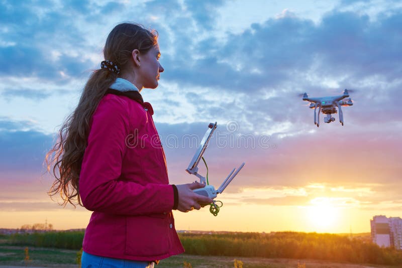 Drone flying at sunset stock photo. Image of motion - 107623168
