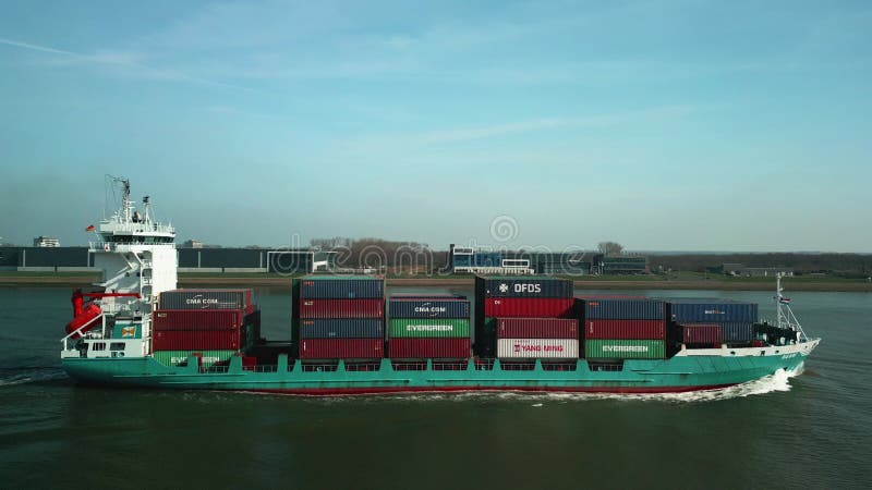Drone Footage of a Container Ship with a Cargo of Containers Sailing on ...