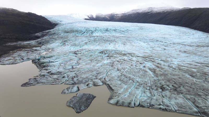 Drone Footage of Gonio Beach and Coastal Buildings with Mountains in ...