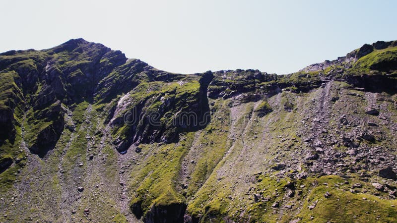Drone Footage of a Rock Mountain Covered in Greenery. High Resolution ...