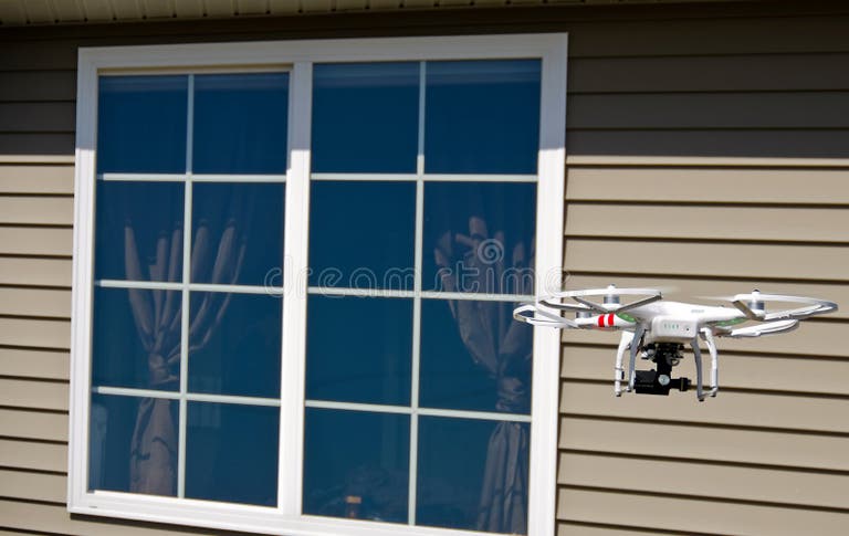 Drone Hovering by House Window Stock Image - Image of windowpane ...