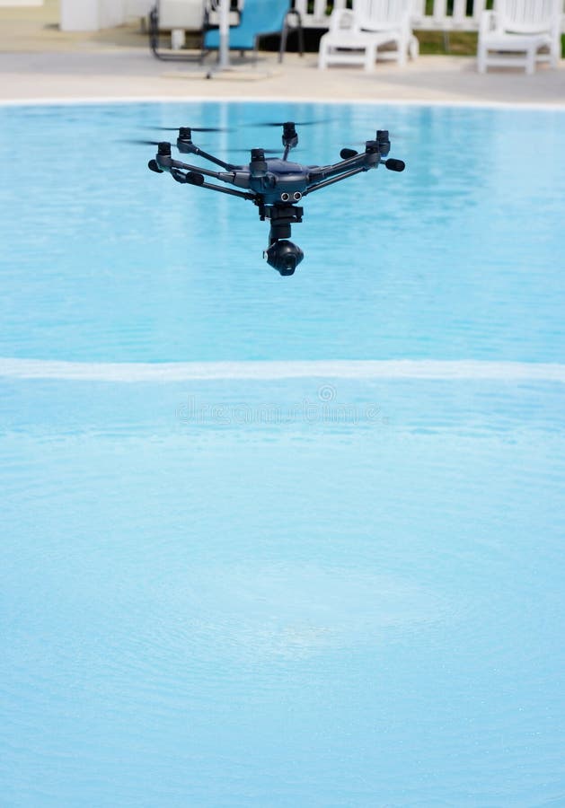 Drone Hovering Over Swimming Pool Stock Image - Image of technique ...