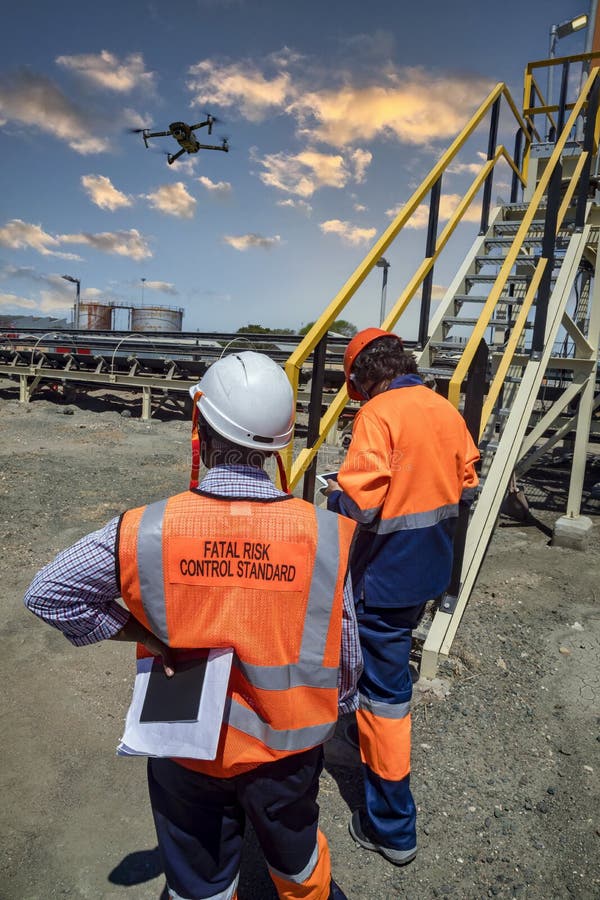 Drone Inspection. Operator Inspecting Construction Building Site Flying ...