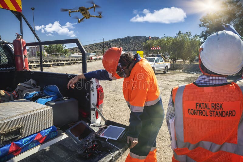 Drone Inspection. Operator Inspecting Construction Building Site Flying ...