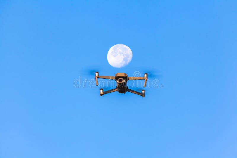 Drone and the Moon in Blue Sky Stock Photo - Image of background ...