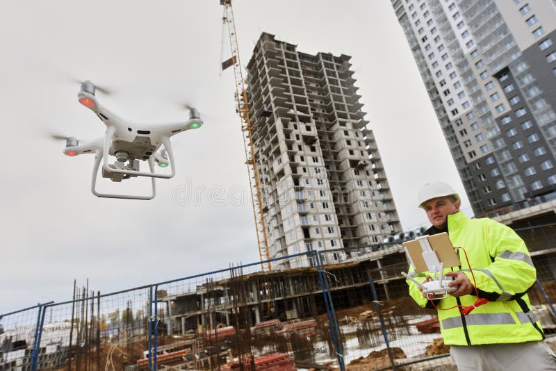 Drone Operated by Construction Worker on Building Site Stock Image ...