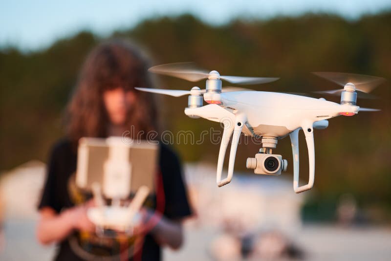 Drone Operated by Young Man Flying Over an Sea Stock Image - Image of ...