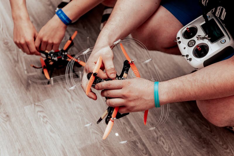 Drone Operator Controls Flying Quadcopter, Modern Remote Technology ...