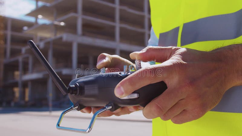 Drone Operator Holding Remote Controller. Professional Builder in ...
