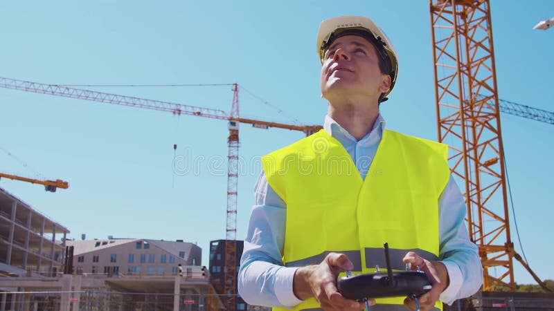 Drone Operator Holding Remote Controller. Professional Builder in ...