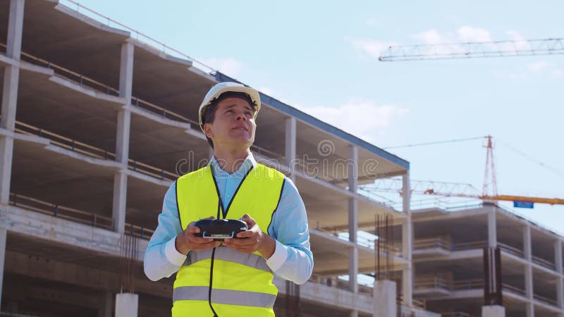 Drone Operator Holding Remote Controller. Professional Builder in ...
