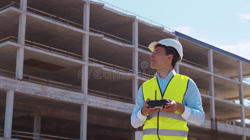 Drone Operator Holding Remote Controller. Professional Builder in ...