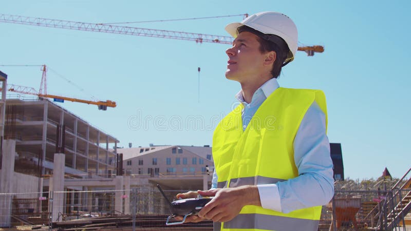 Drone Operator Holding Remote Controller. Professional Builder in ...
