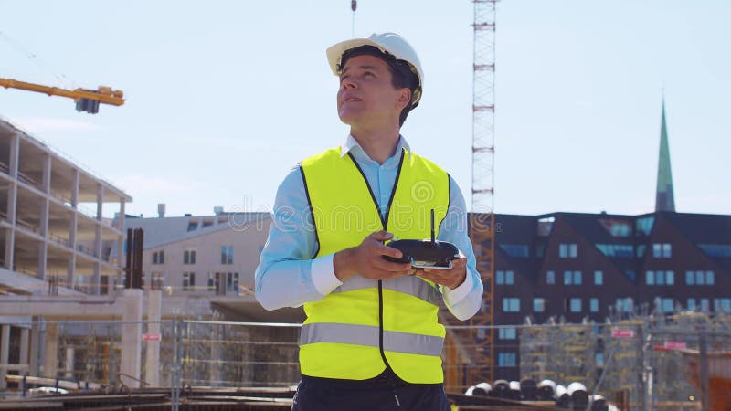 Drone Operator Holding Remote Controller. Professional Builder in ...