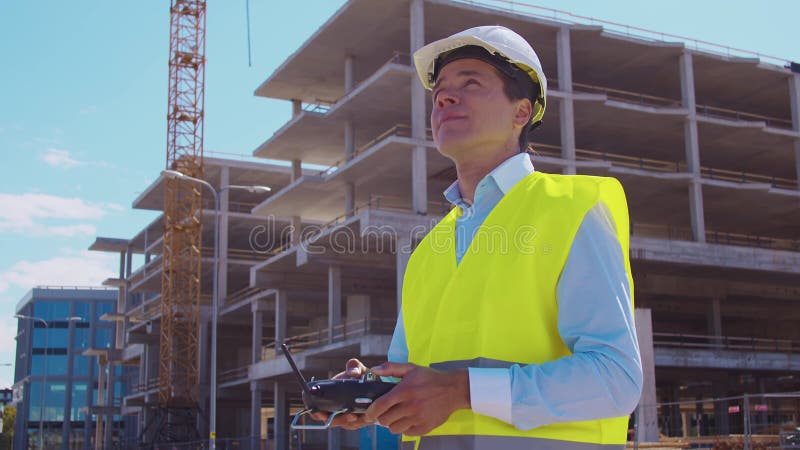 Drone Operator Holding Remote Controller. Professional Builder in ...