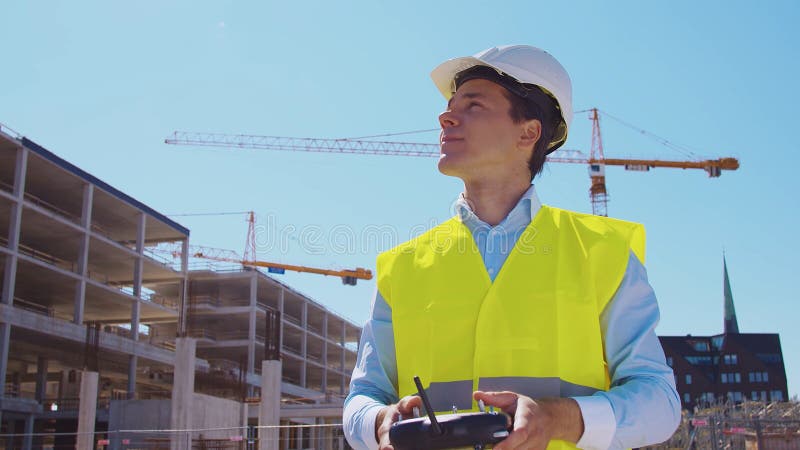 Drone Operator Holding Remote Controller. Professional Builder in ...