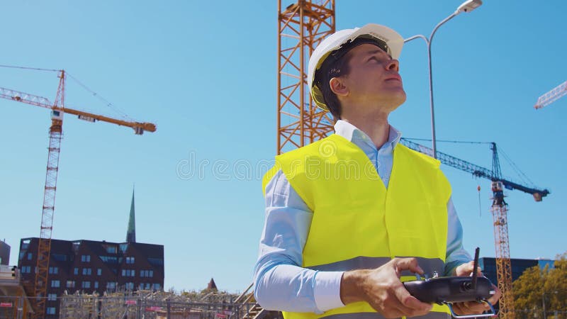 Drone Operator Holding Remote Controller. Professional Builder in ...