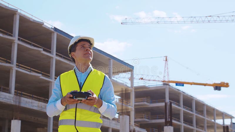 Drone Operator Holding Remote Controller. Professional Builder in ...
