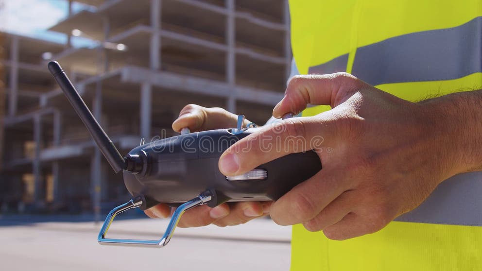 Drone Operator Holding Remote Controller. Professional Builder in ...