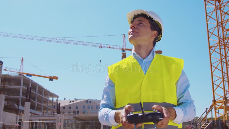 Drone Operator Holding Remote Controller. Professional Builder in ...