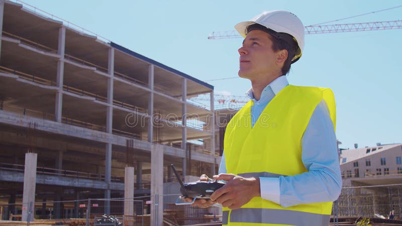 Drone Operator Holding Remote Controller. Professional Builder in ...