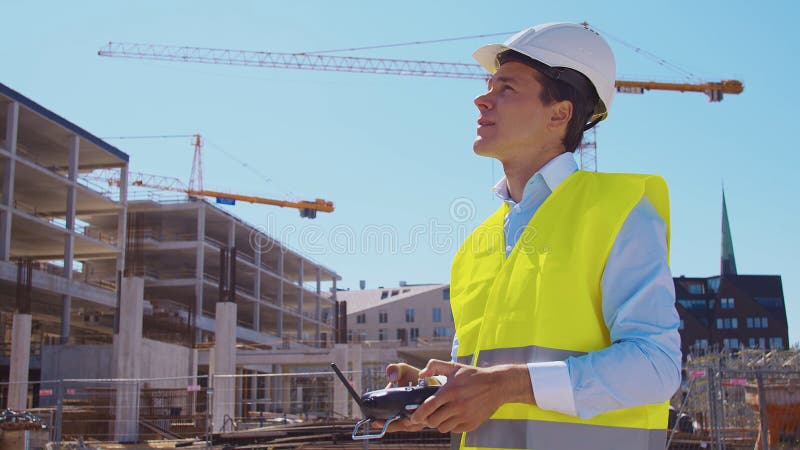 Drone Operator Holding Remote Controller. Professional Builder in ...