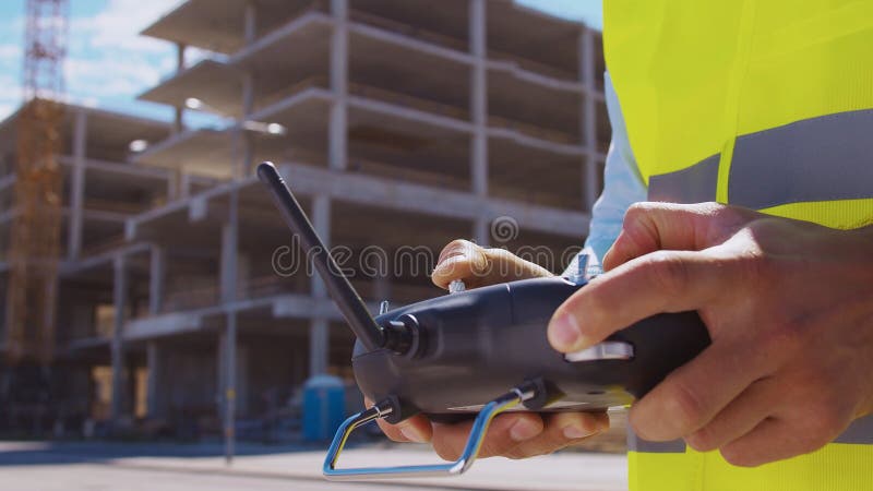 Drone Operator Holding Remote Controller. Professional Builder in ...
