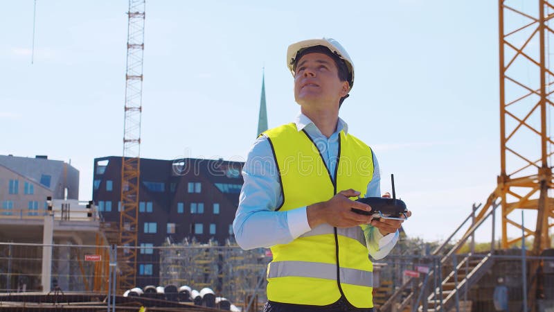 Drone Operator Holding Remote Controller. Professional Builder in ...