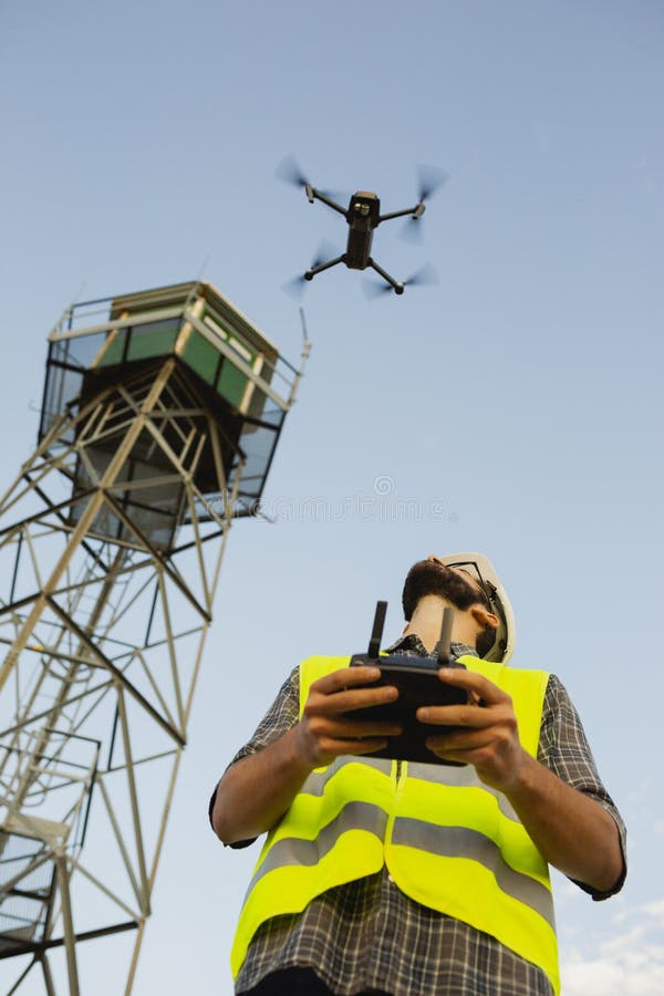 Drone Operator Man Piloting a Drone Stock Image - Image of digital ...