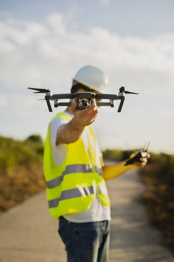 Drone Operator Piloting a Drone Stock Image - Image of filming, aero ...