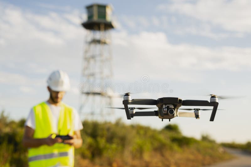 Drone Operator Piloting a Drone Stock Photo - Image of electronic ...