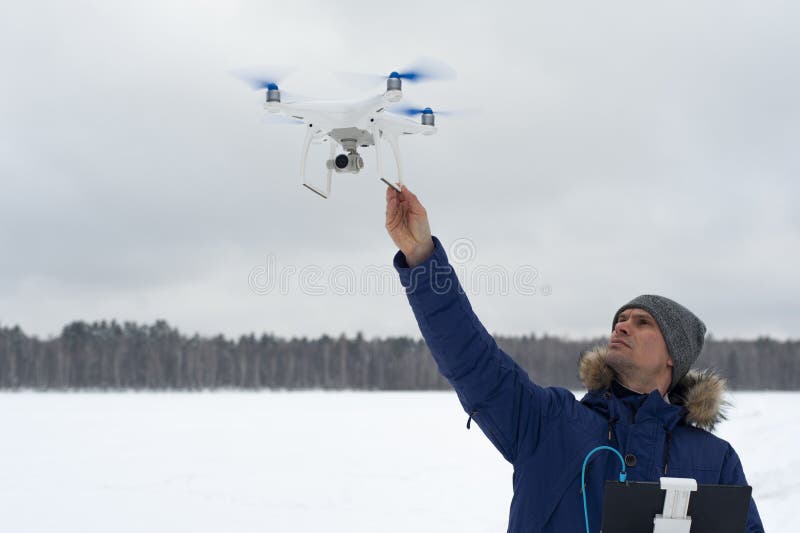 Drone Operator with Remote Control in Winter Landscape Stock Image ...