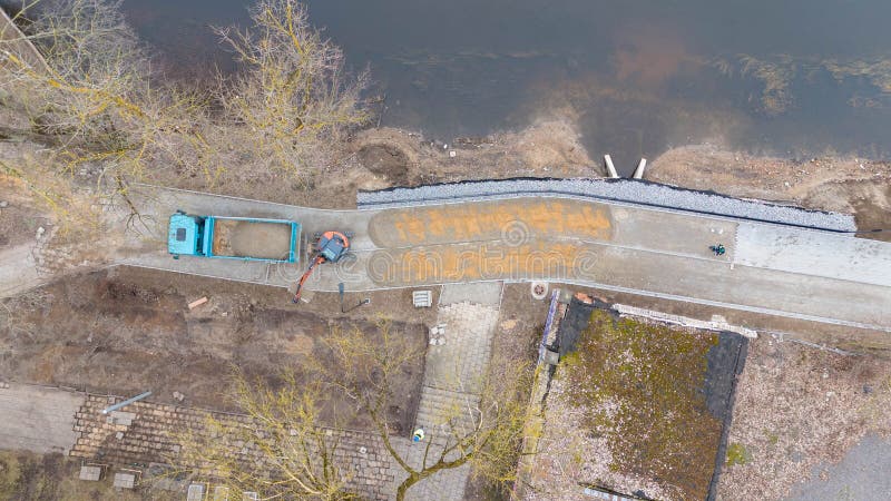 Drone Photography of Construction Workers Renovating and Old Sidewalk ...
