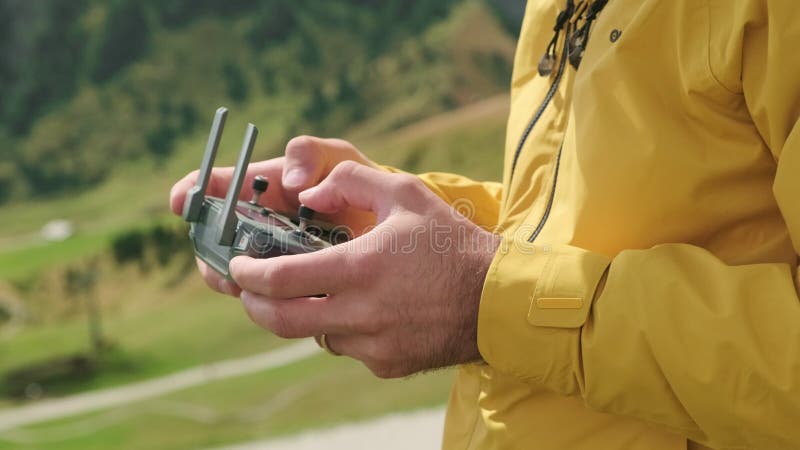 Drone Pilot Rotates Joystick Of Controller Giving Commands Stock Video