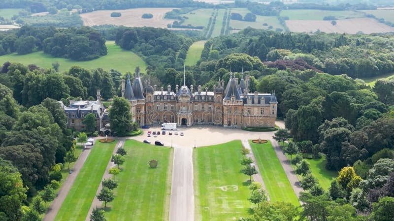 Drone Pullback View of Waddesdon Manor on Top of a Hill Surrounded by ...