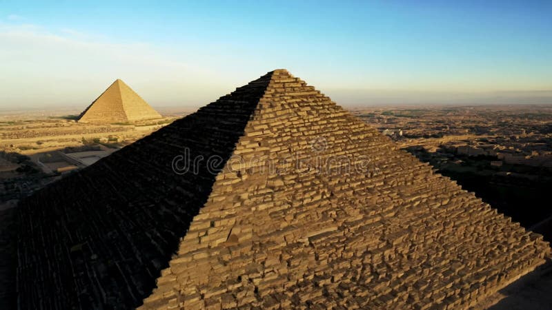 Drone Pullout Over the Pyramids of Giza on a Sunny Day with Clear Sky ...