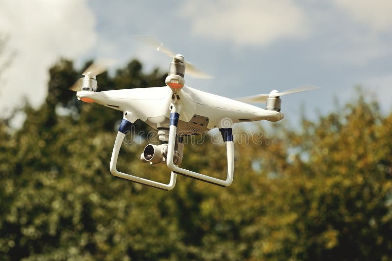 Drone Quad Copter with Digital Camera Stock Photo - Image of mountain ...